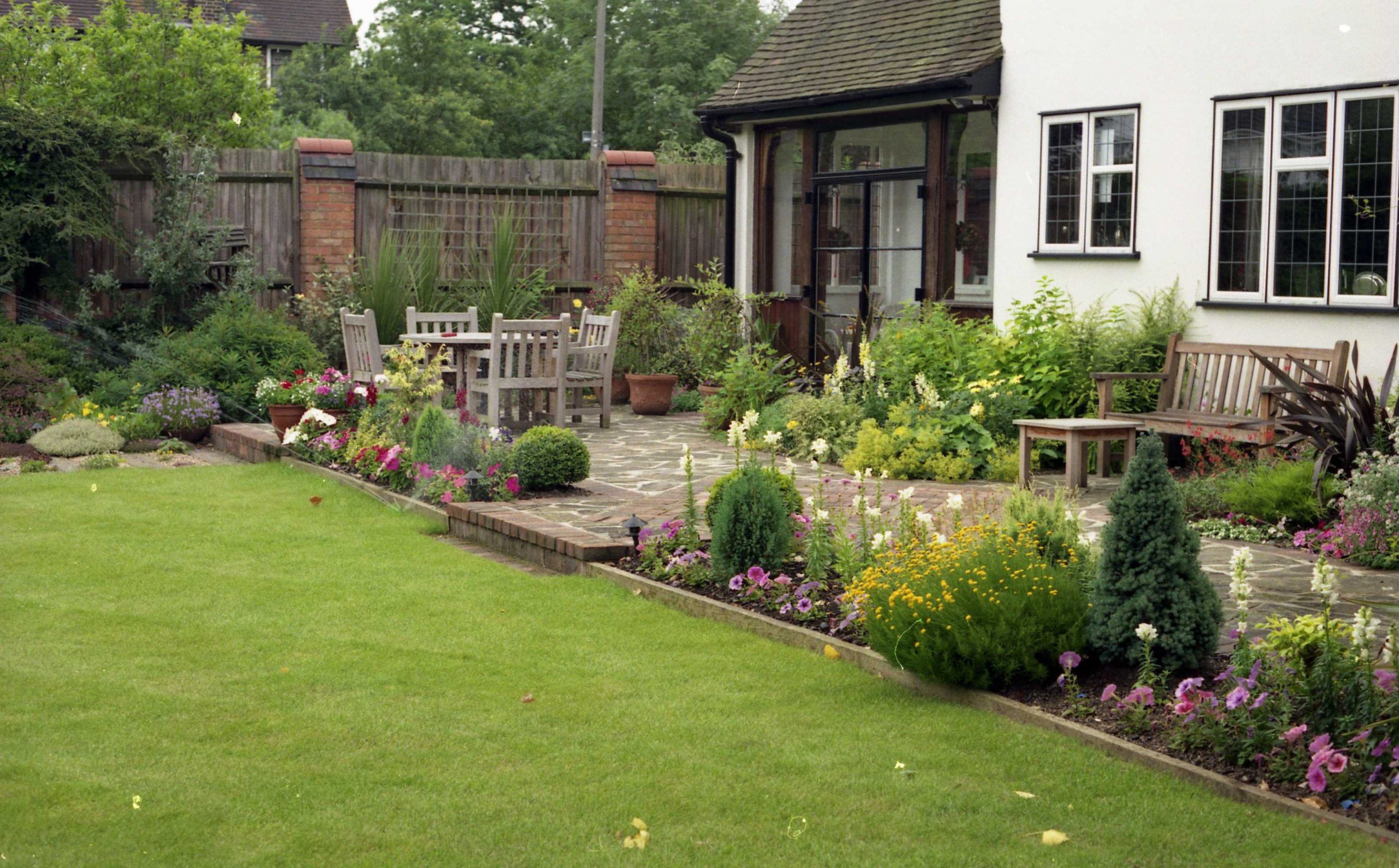 "A rare moment of peace in the perfect haven of a garden brings us ...